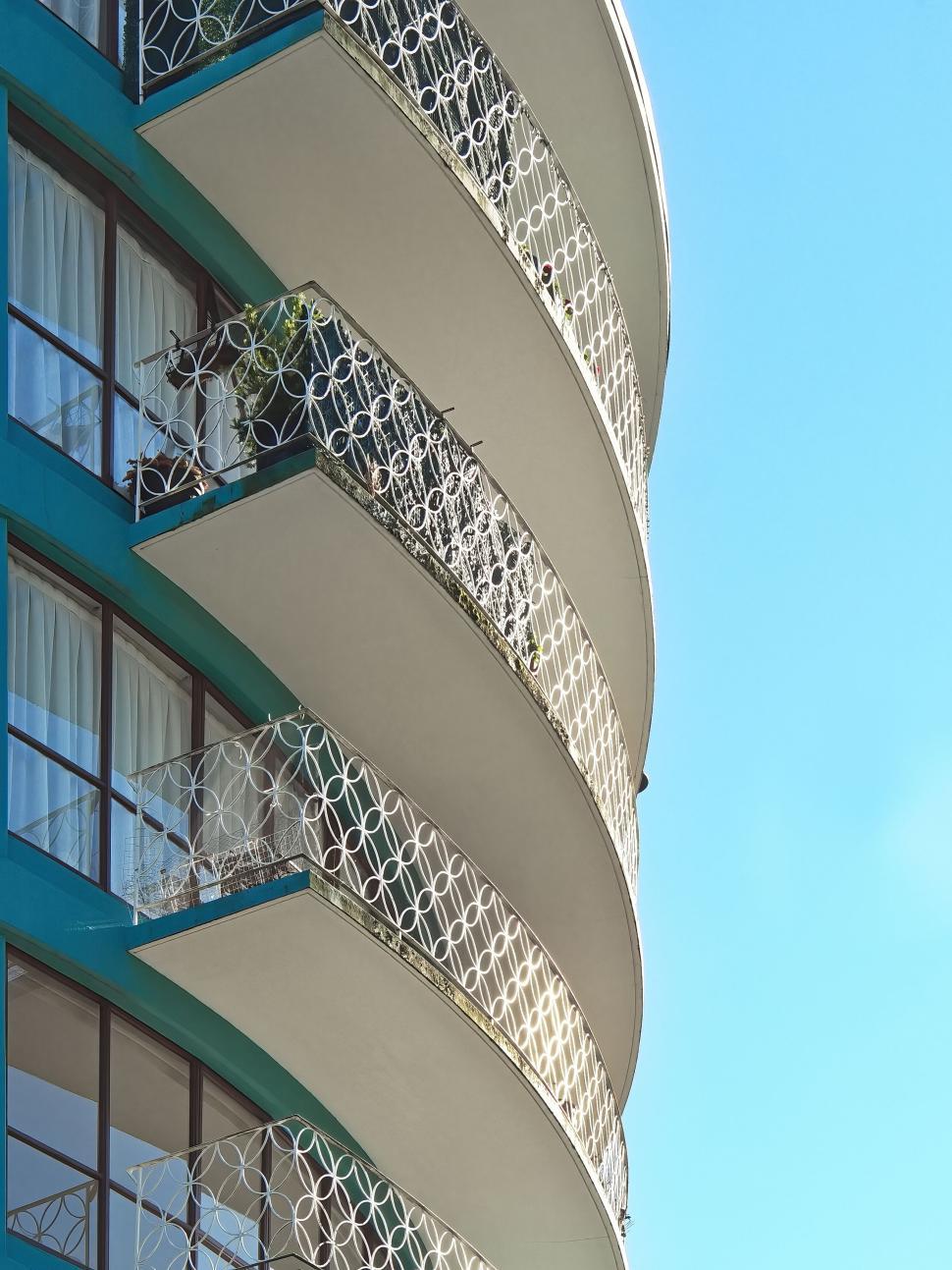 Free Stock Photo of Curved balconies with ornate railings, modern ...