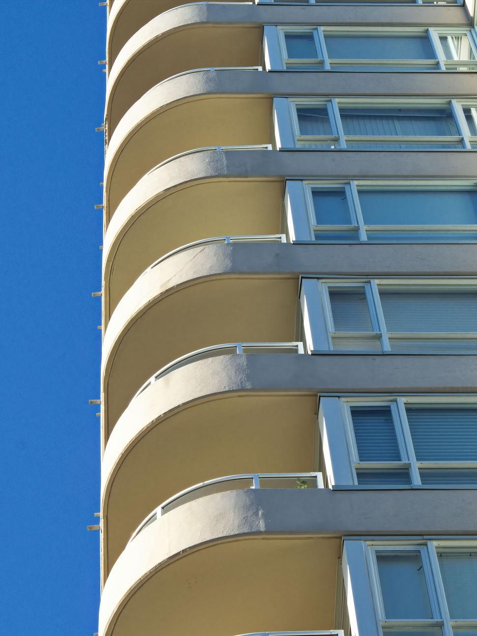 Free Stock Photo of Curved balconies against blue sky on modern ...