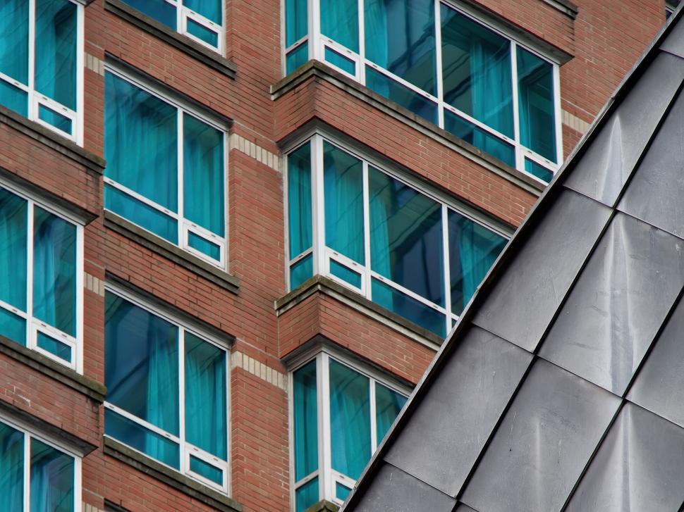 Free Stock Photo of Brick and glass building corner with geometric ...
