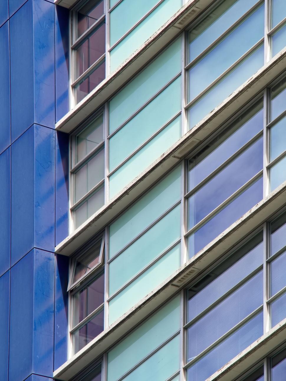 Free Stock Photo of Diagonal close-up of a modern glass building ...