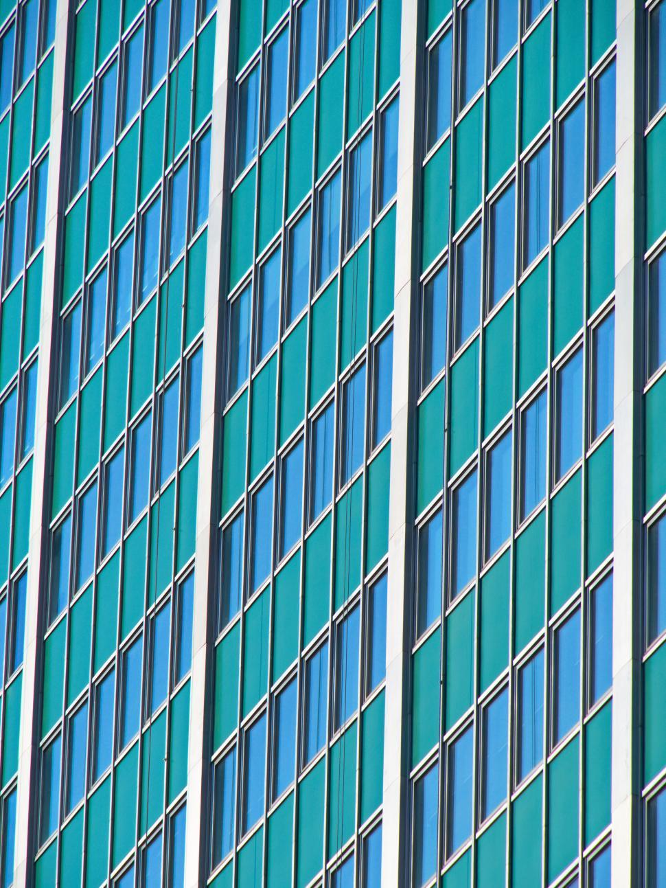 Free Stock Photo of Green glass building with diagonal window patterns ...
