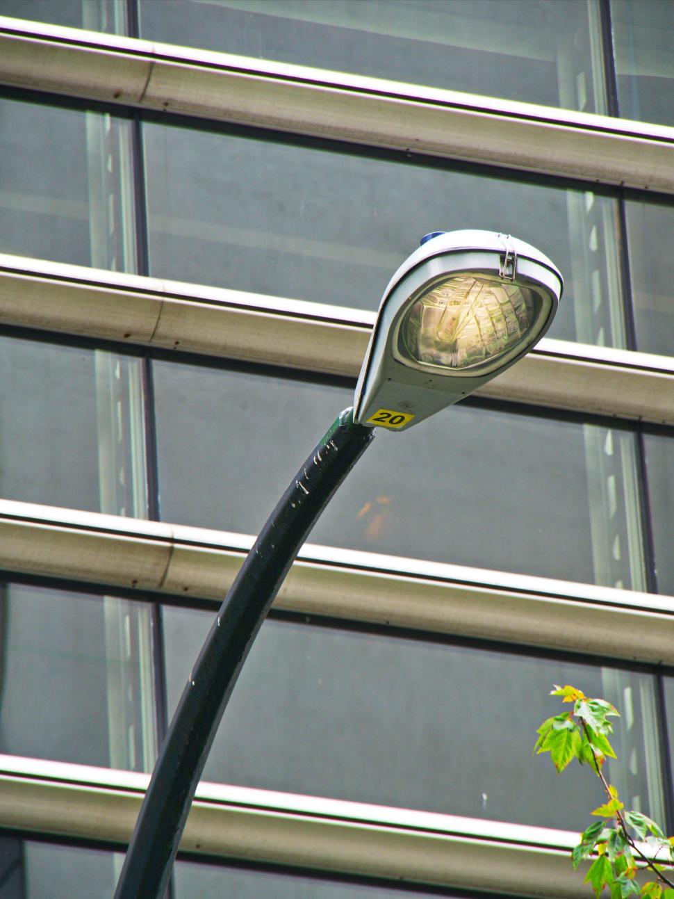 Free Stock Photo of Modern lamp post with sleek design against building ...