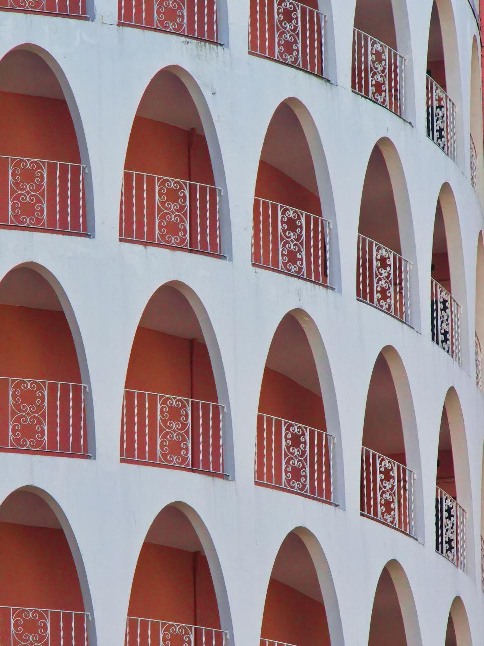 Free Stock Photo of White building with elegant arch balconies and ...