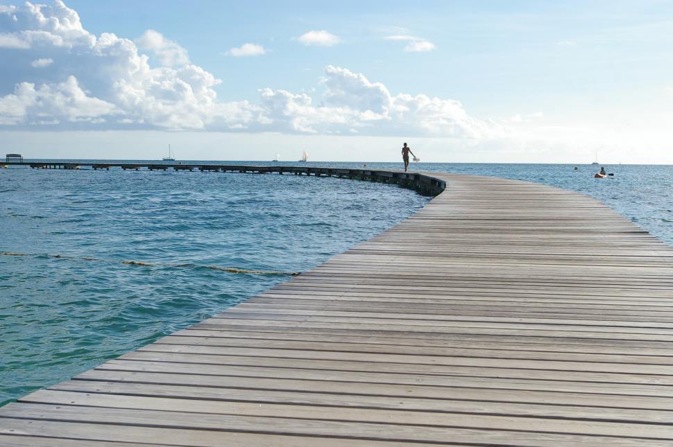 Free Stock Photo of Person Standing on Dock in Middle of Ocean ...