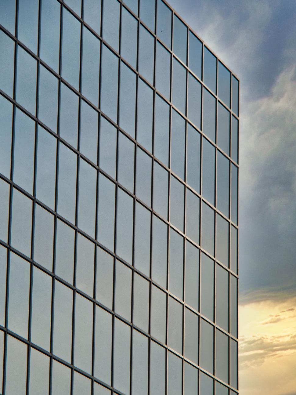 Free Stock Photo of Glass-paneled building reflecting the evening sky ...