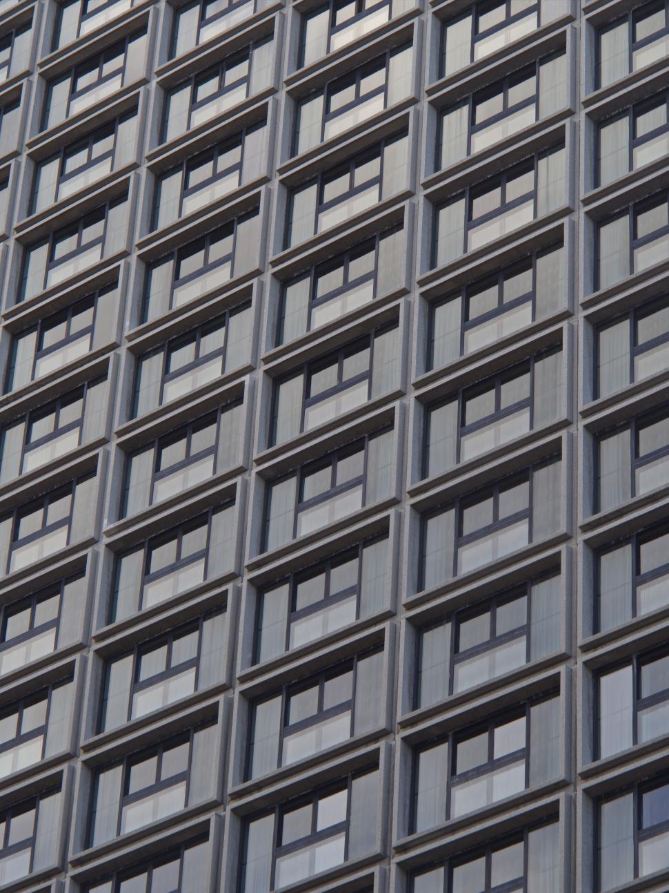 Free Stock Photo of Grid pattern windows on corporate urban skyscraper ...