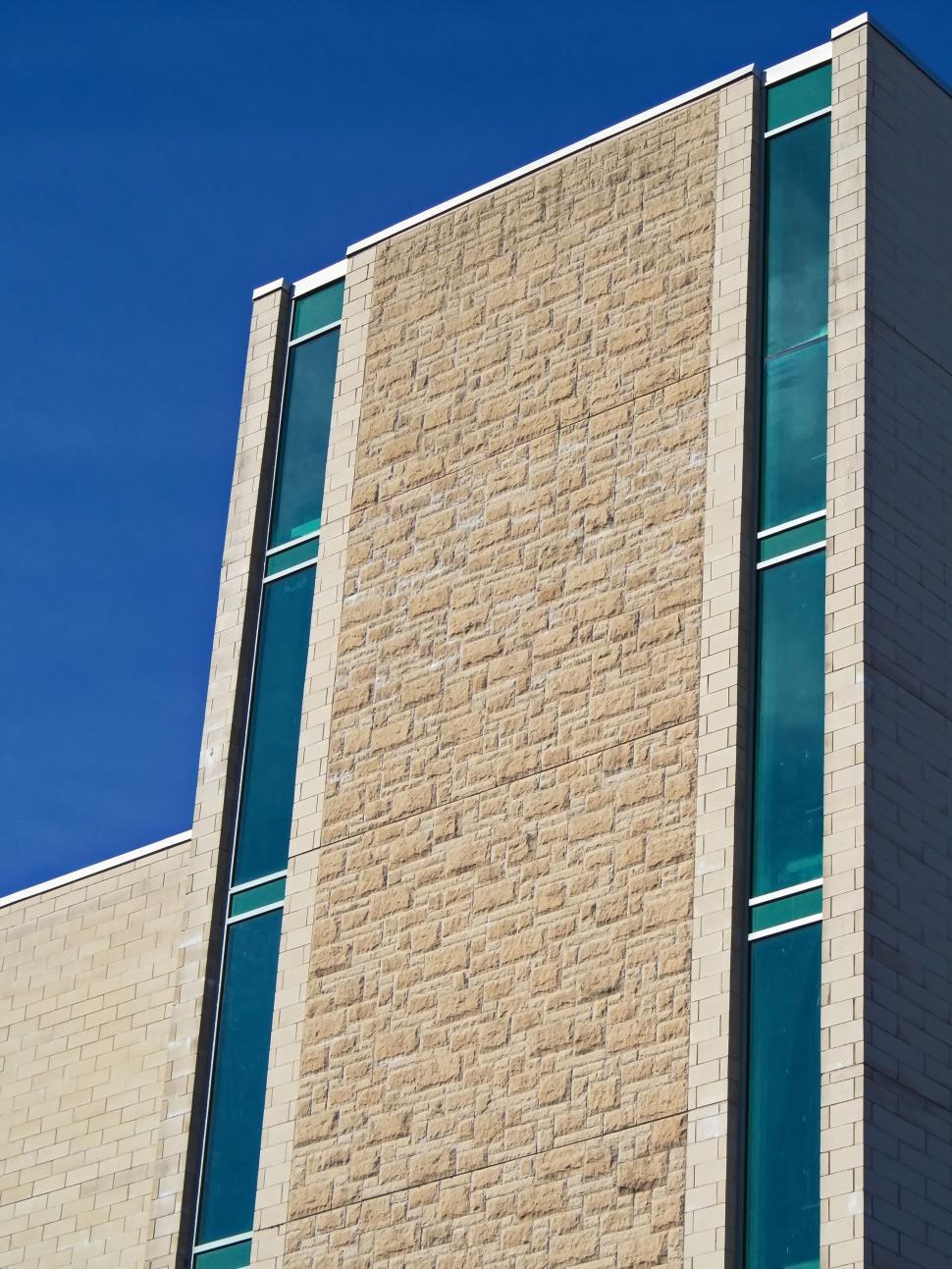 Free Stock Photo of Stone facade on modern building with vertical ...
