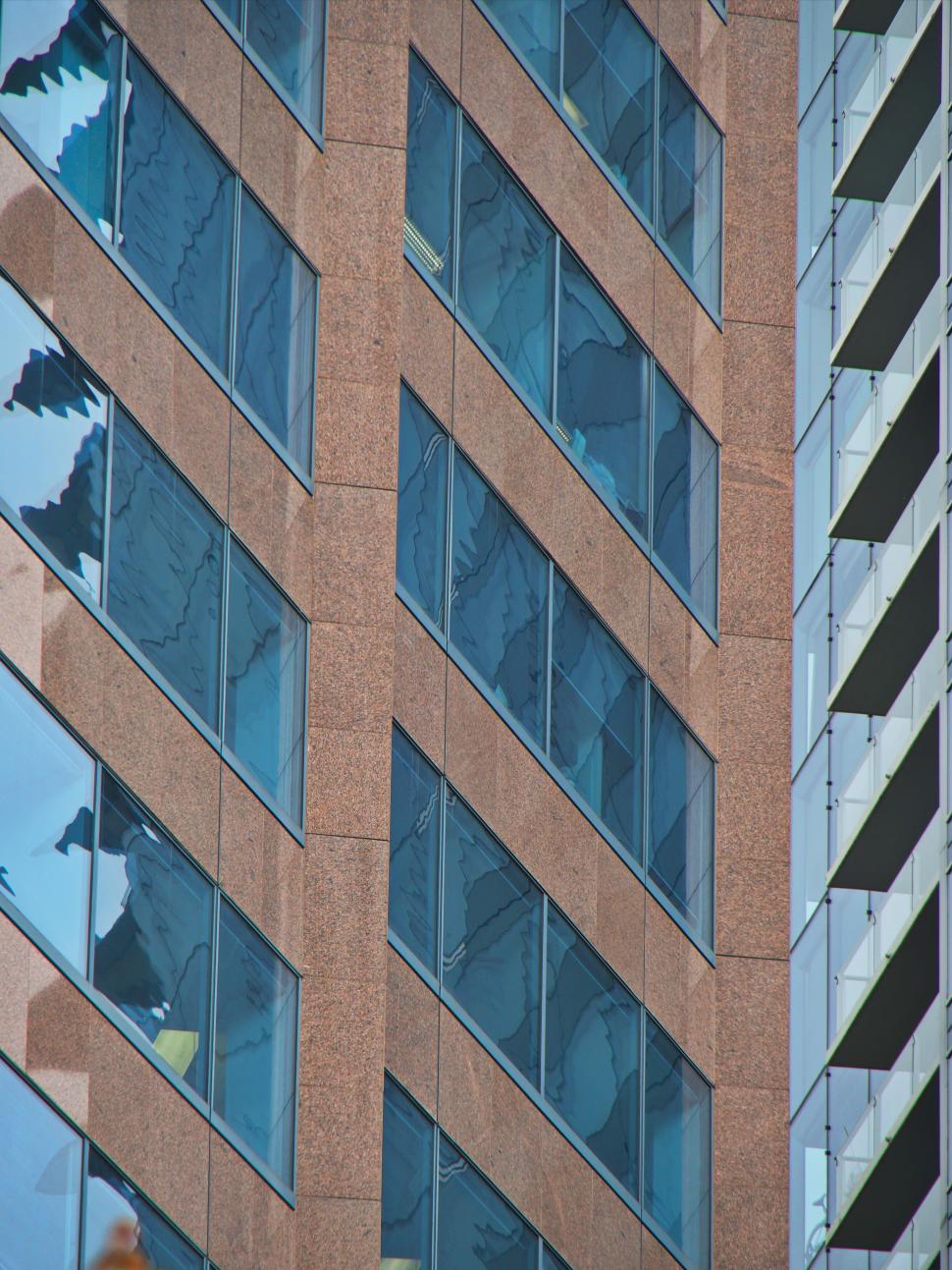 Free Stock Photo of Brown Brick Building with Diagonal Windows ...