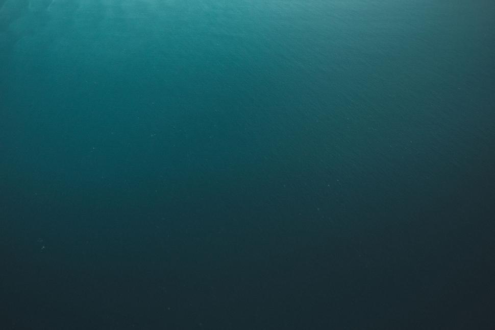 Free Stock Photo of Vast expanse of deep blue water with subtle ...