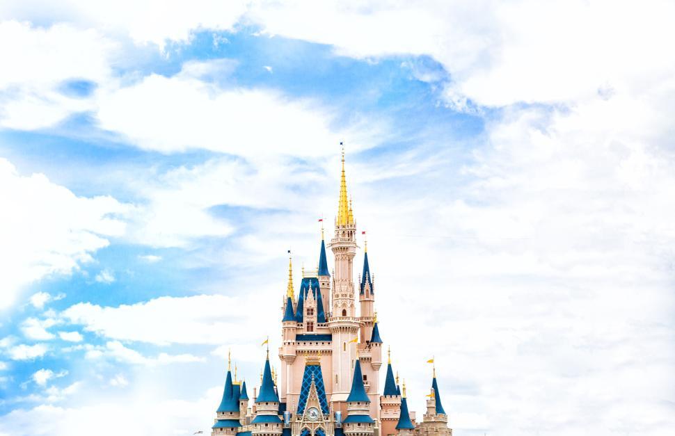 Free Stock Photo of Disney castle with blue and golden towers under ...