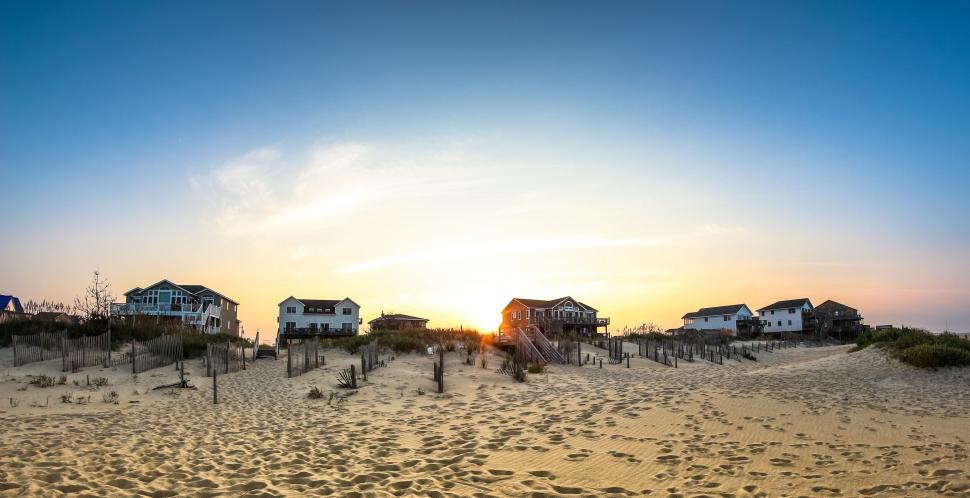 Free Stock Photo of Sunset view of beachfront houses on a sandy ...