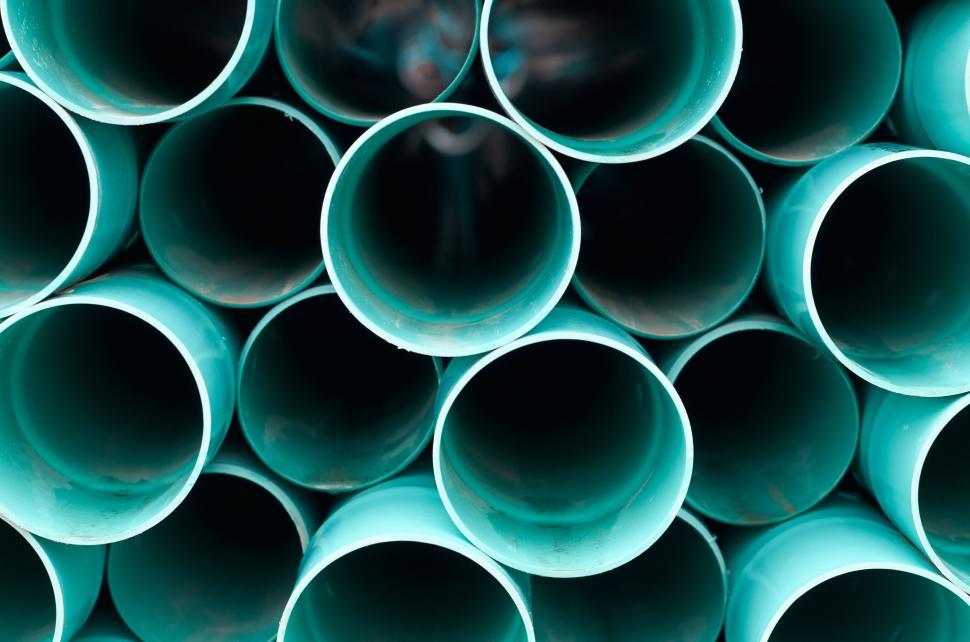 Free Stock Photo of Stack of turquoise tubes arranged in a circular ...