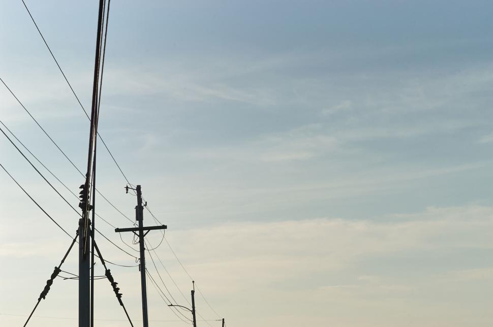 Free Stock Photo of Series of utility poles with blue sky background ...