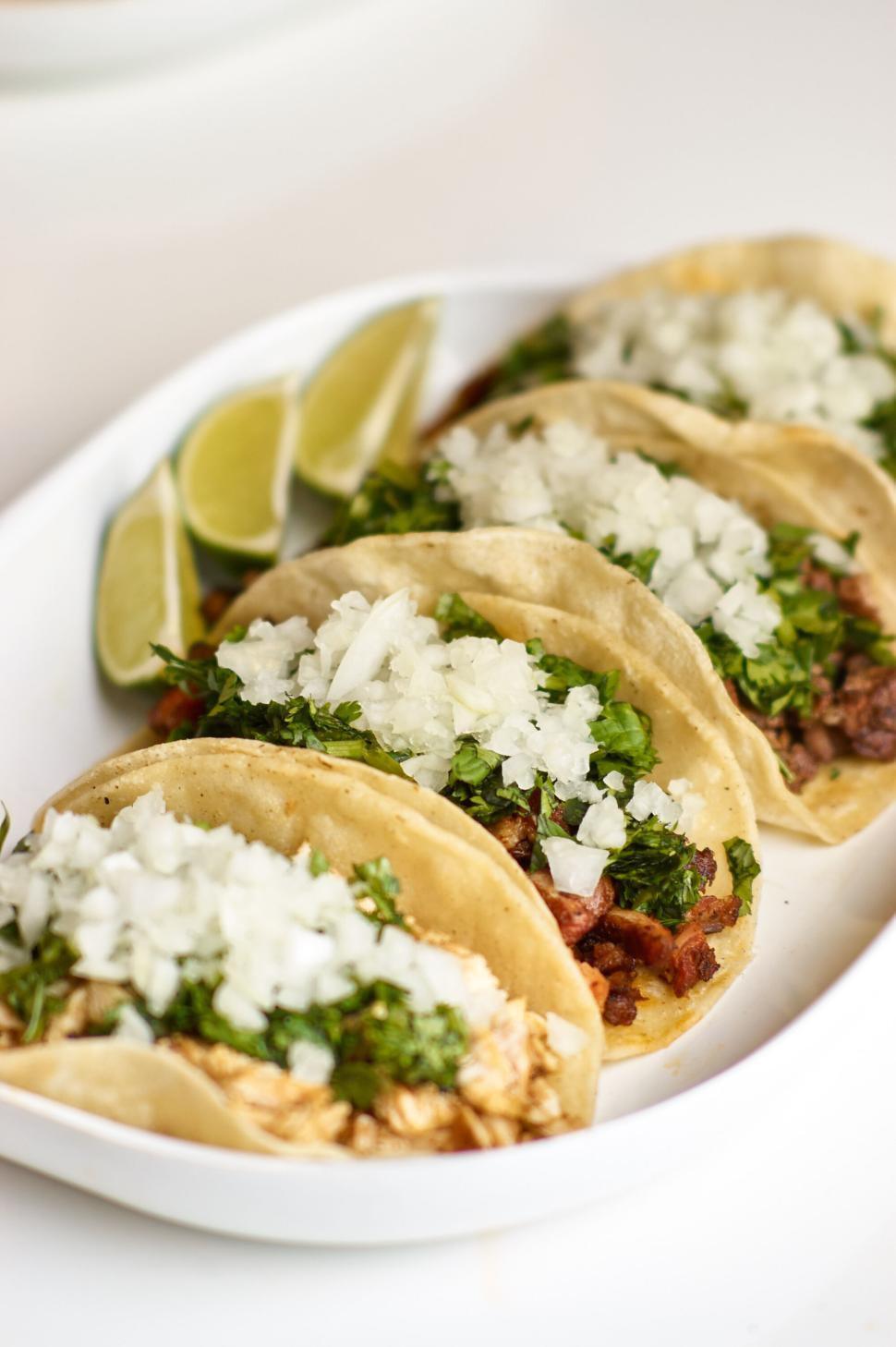 Free Stock Photo of Four tacos with onions, cilantro, and lime wedges ...