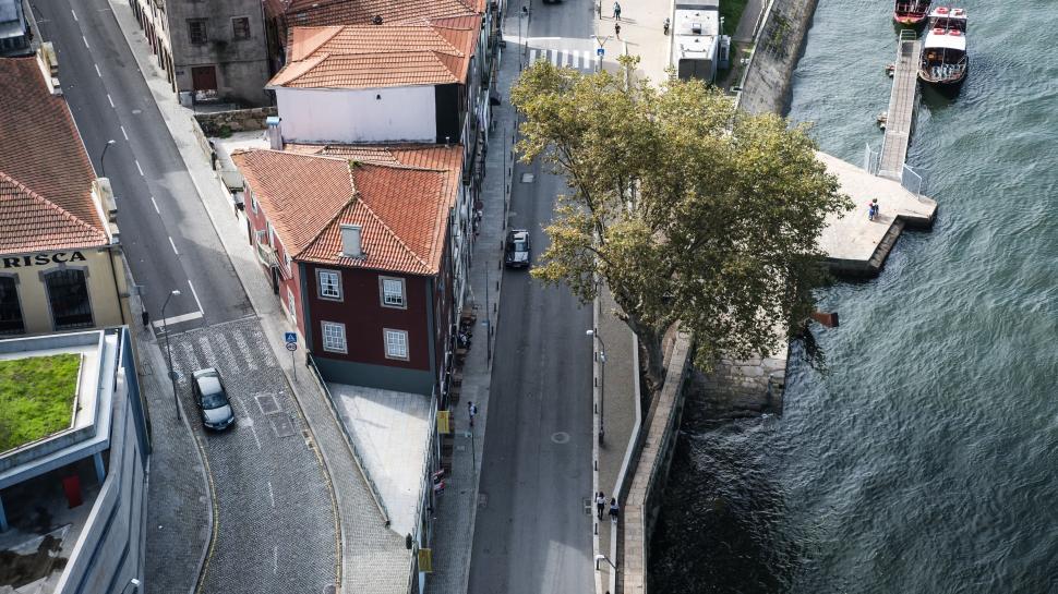 Free Stock Photo of Aerial view of a street by the riverside in a city ...