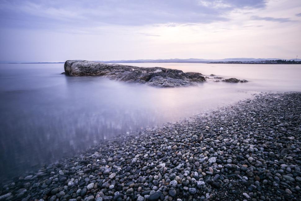 Free Stock Photo of Rock formation in calm sea at sunset in calming ...