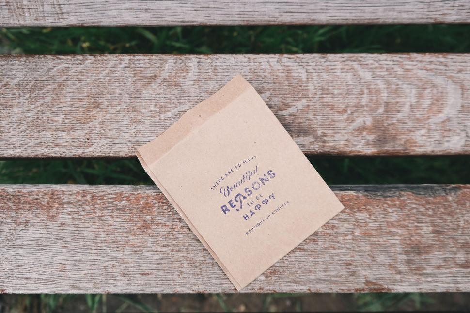 Free Stock Photo of Brown paper envelope on a rustic wooden bench ...
