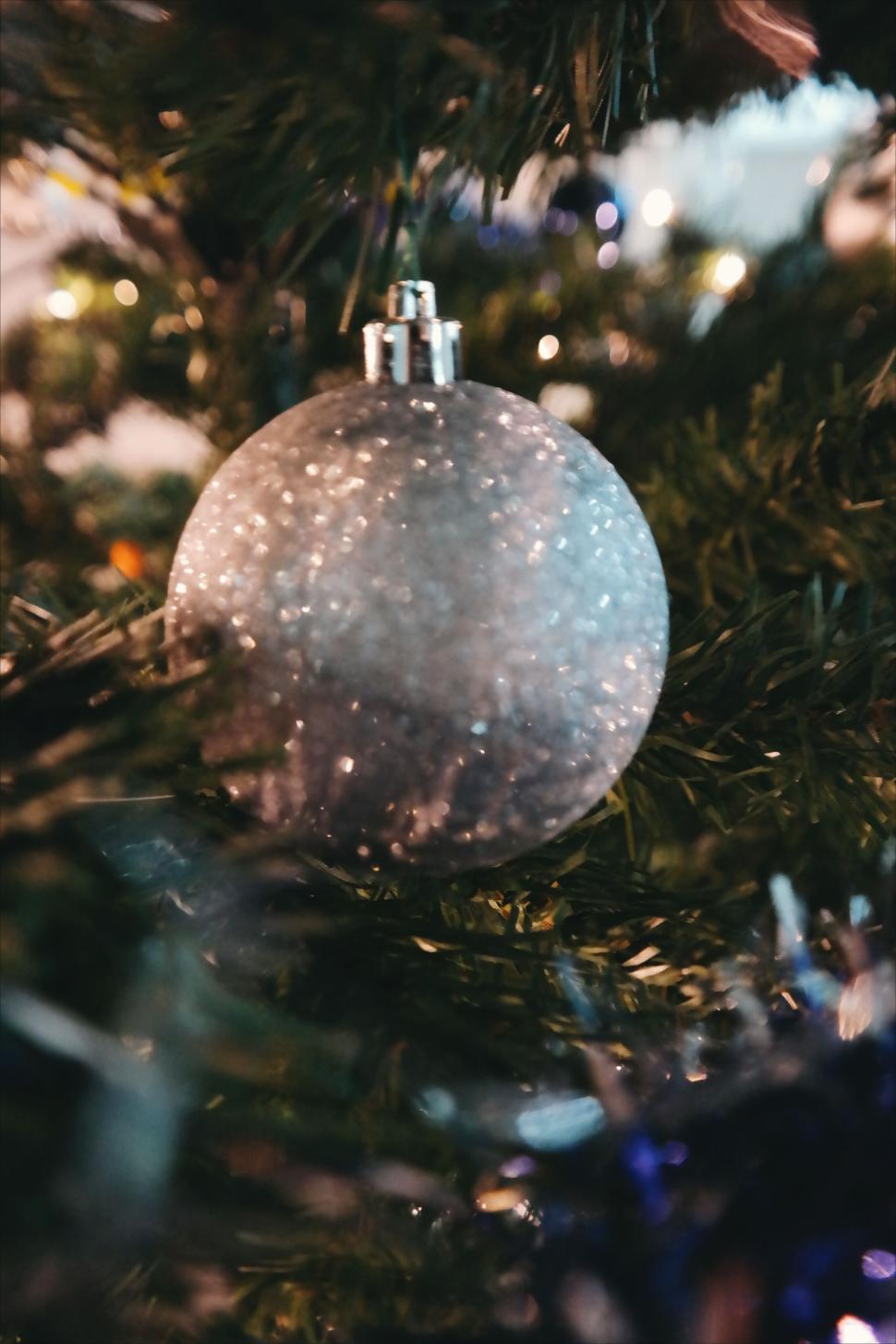 Free Stock Photo of Glittery silver Christmas ornament on a festive ...
