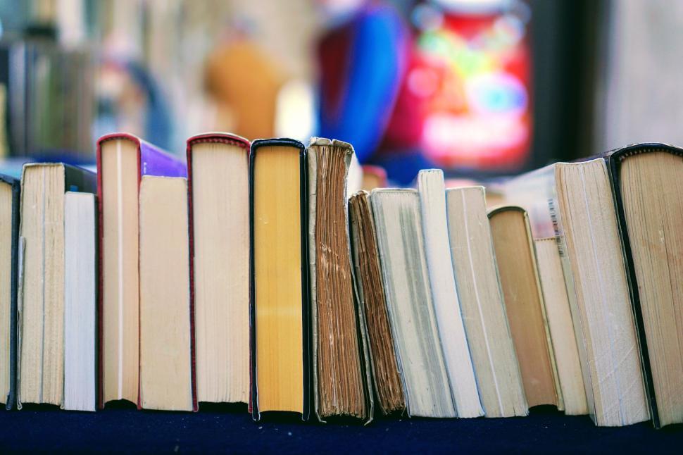 Free Stock Photo of Books arranged in a colorful alignment on display ...