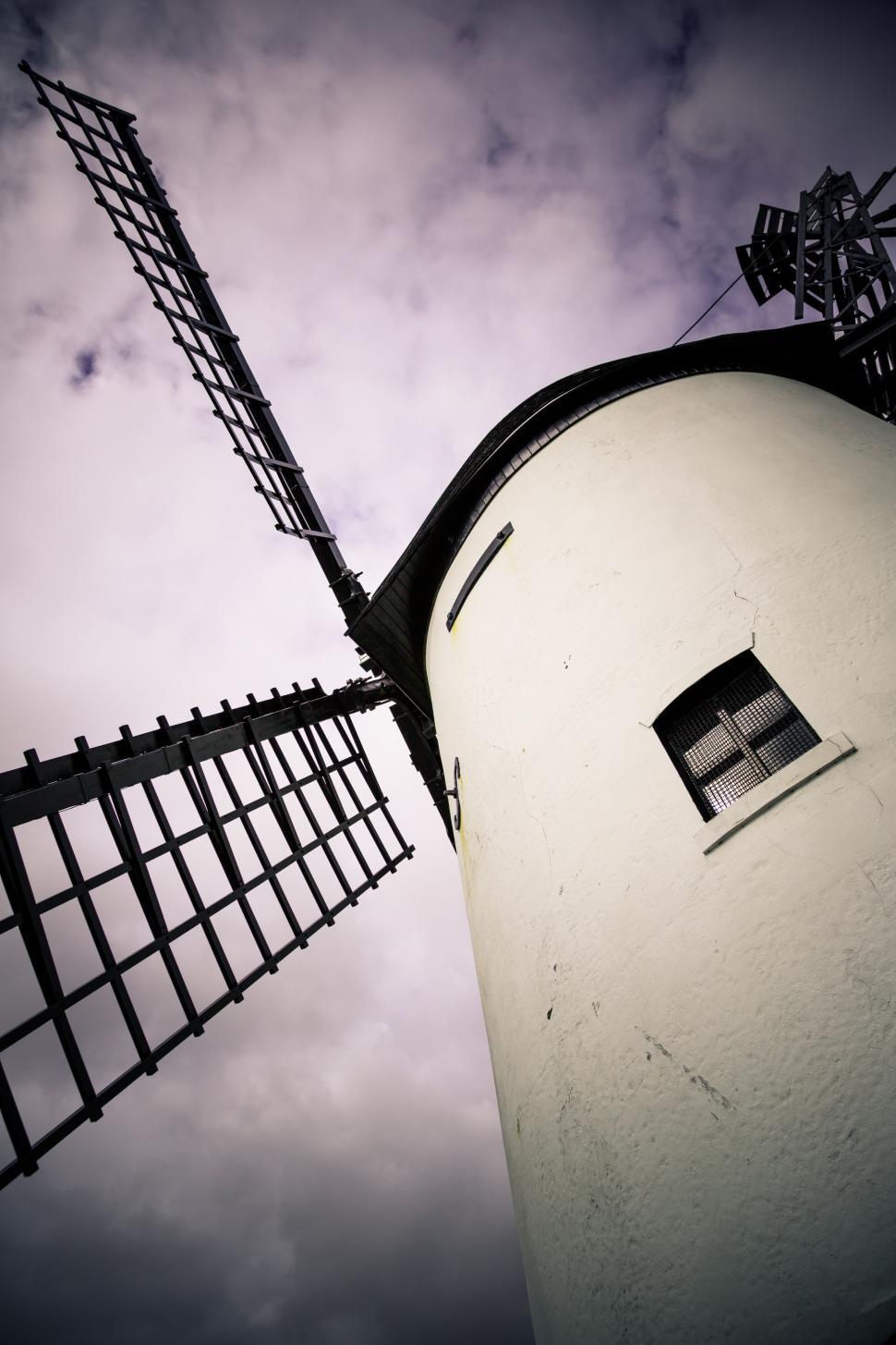 Free Stock Photo of Windmill towering against a cloudy sky in ...