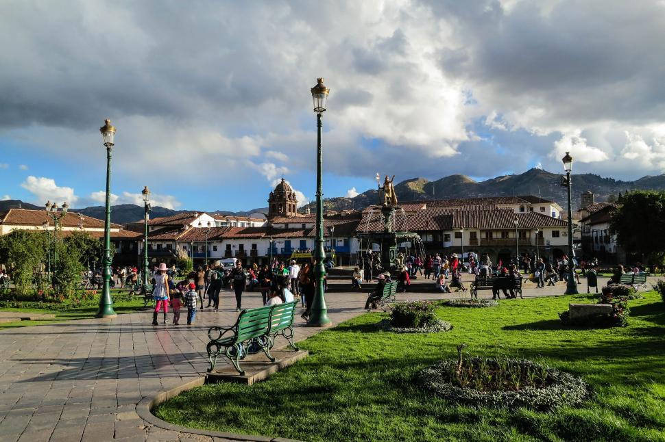 Free Stock Photo of Busy town square with people under a cloudy blue ...