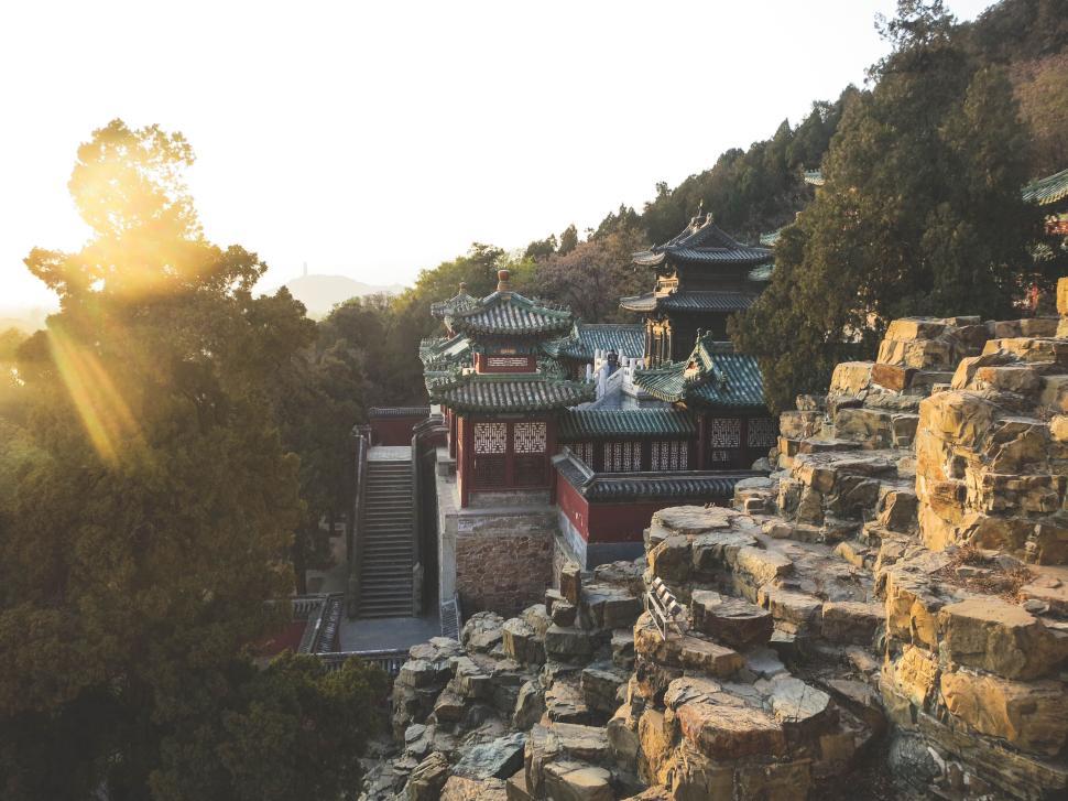 Free Stock Photo of Ancient Chinese temple amidst rocks with sun ...