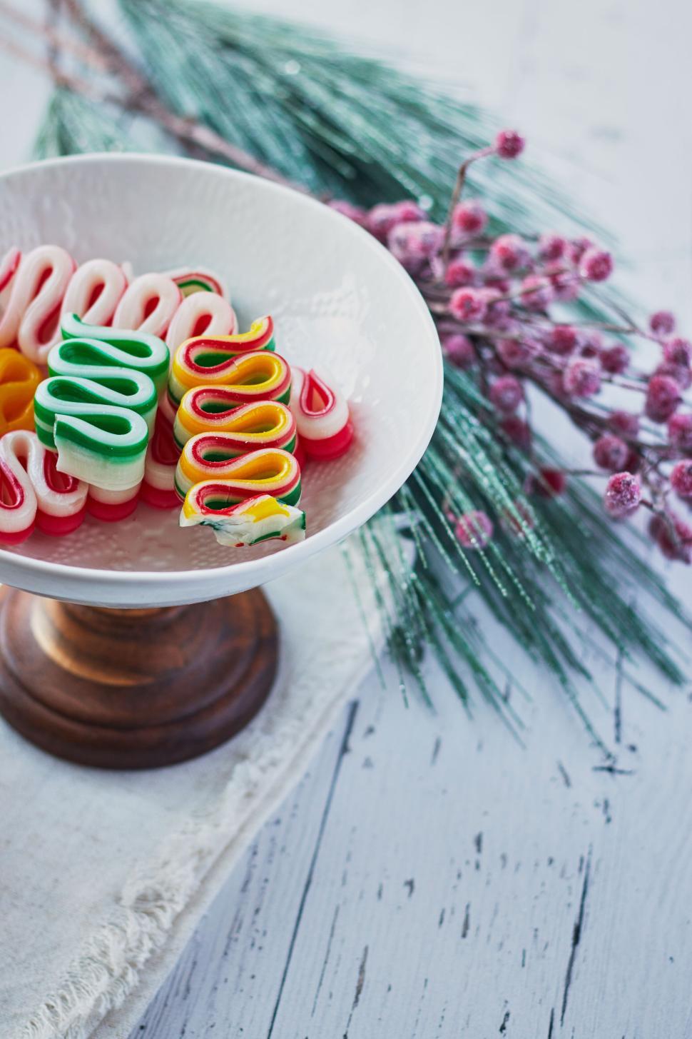 Free Stock Photo of Colorful festive candy ribbon on white dish display ...