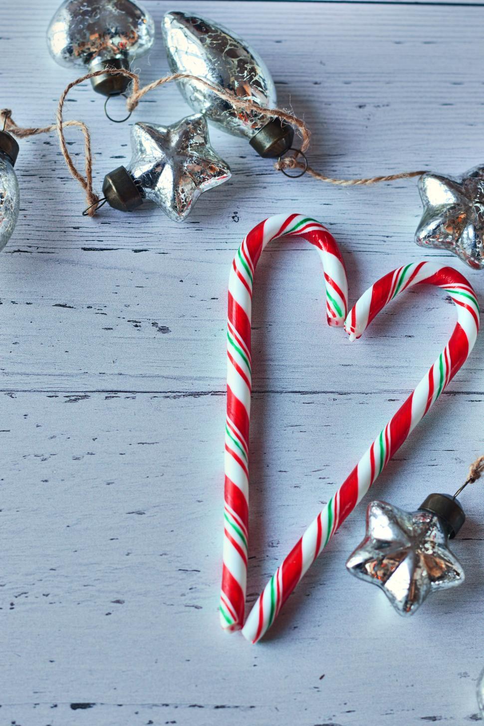 Free Stock Photo of Candy cane in a heart shape with Christmas ...