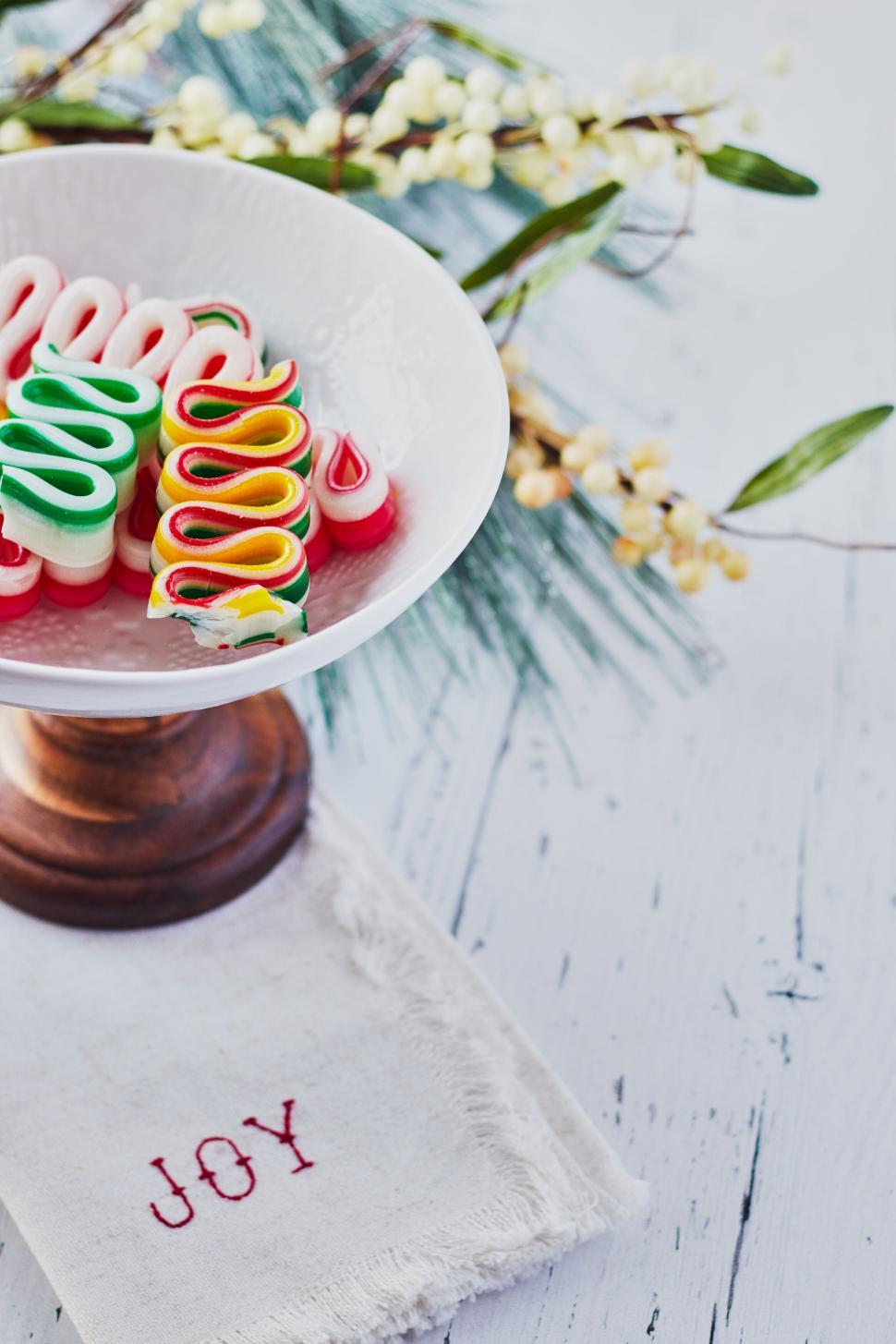 Free Stock Photo of Colorful candy ribbons in a white bowl on a stand ...