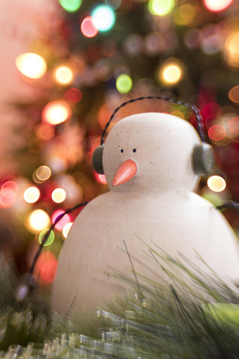 Free Stock Photo of Christmas snowman figurine with headphones on ...