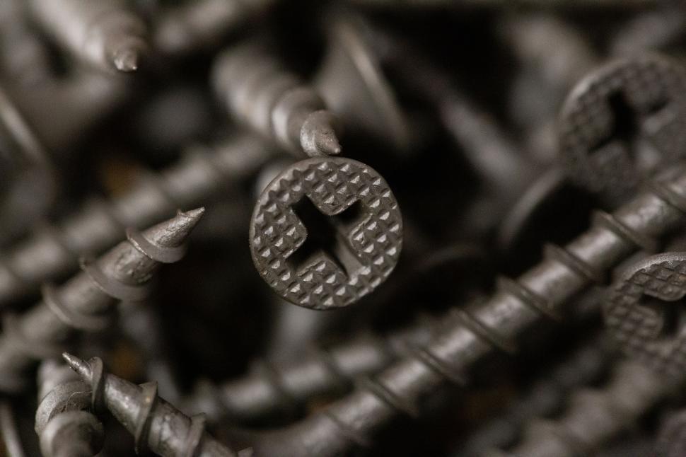 Free Stock Photo of Close-up of metal screws with cross-shaped heads ...