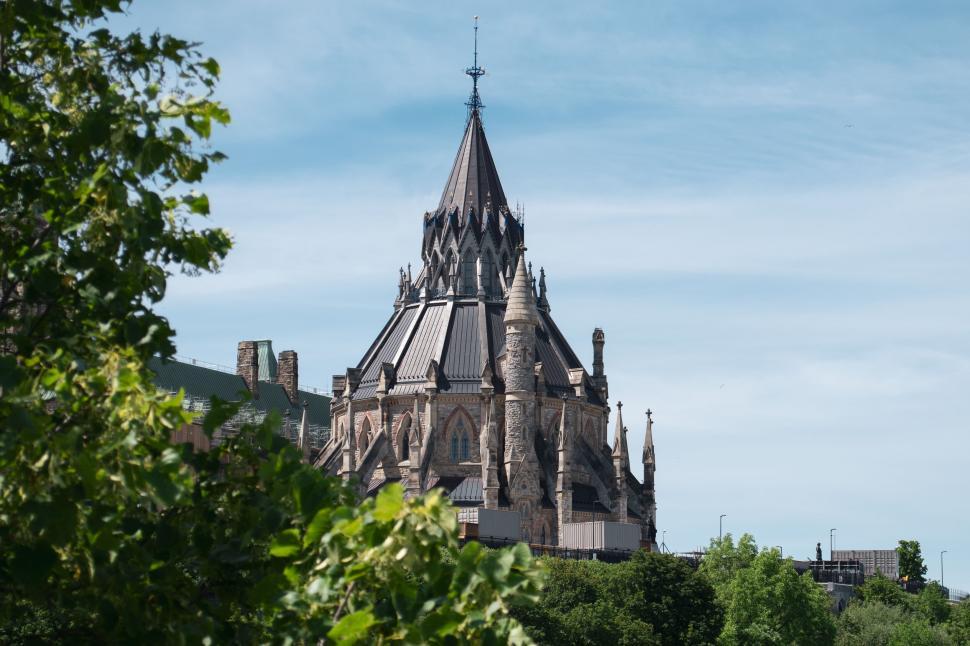 Free Stock Photo of Ancient Gothic-style building surrounded by green ...