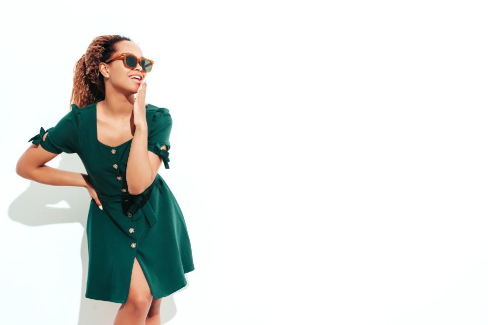 Free Stock Photo of Cheerful woman laughing in green dress and ...