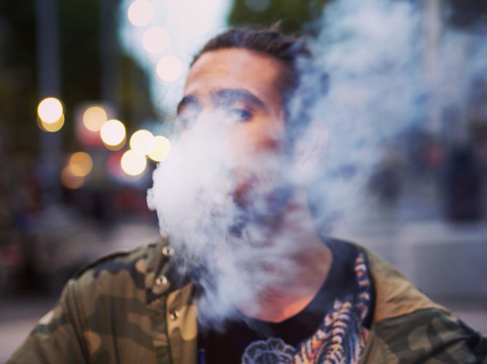 Free Stock Photo of Person exhaling vapor in an outdoors setting at ...