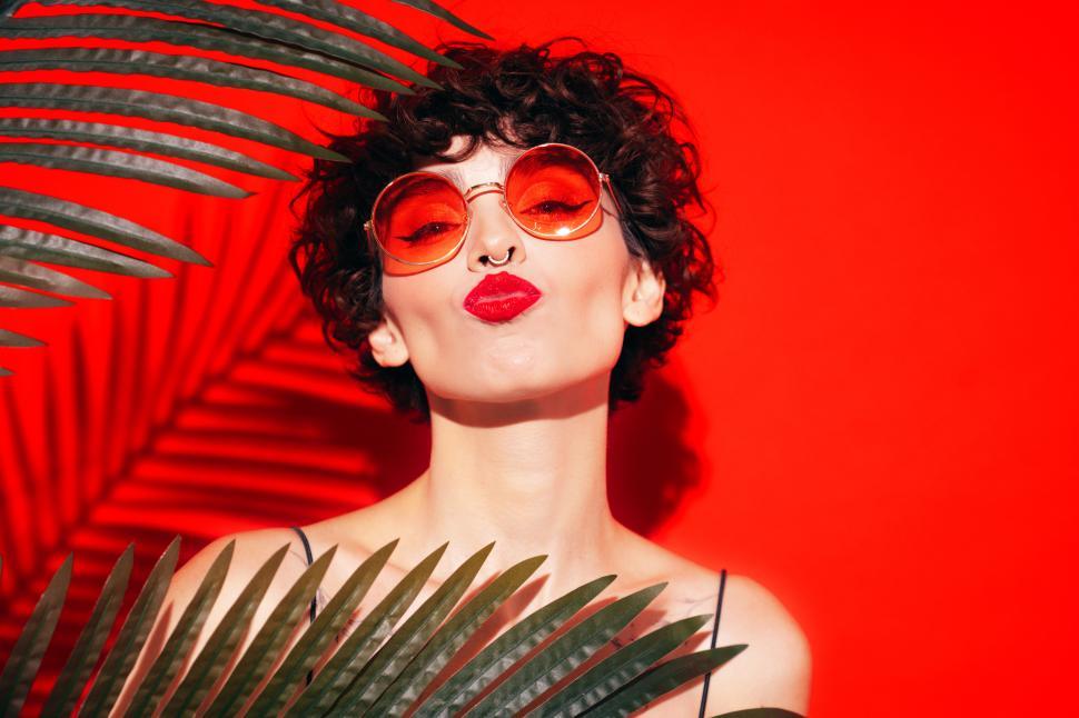 Free Stock Photo of Stylish woman kissing in orange sunglasses, palm ...