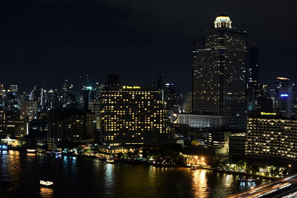 Free Stock Photo of Night cityscape featuring illuminated skyscrapers ...