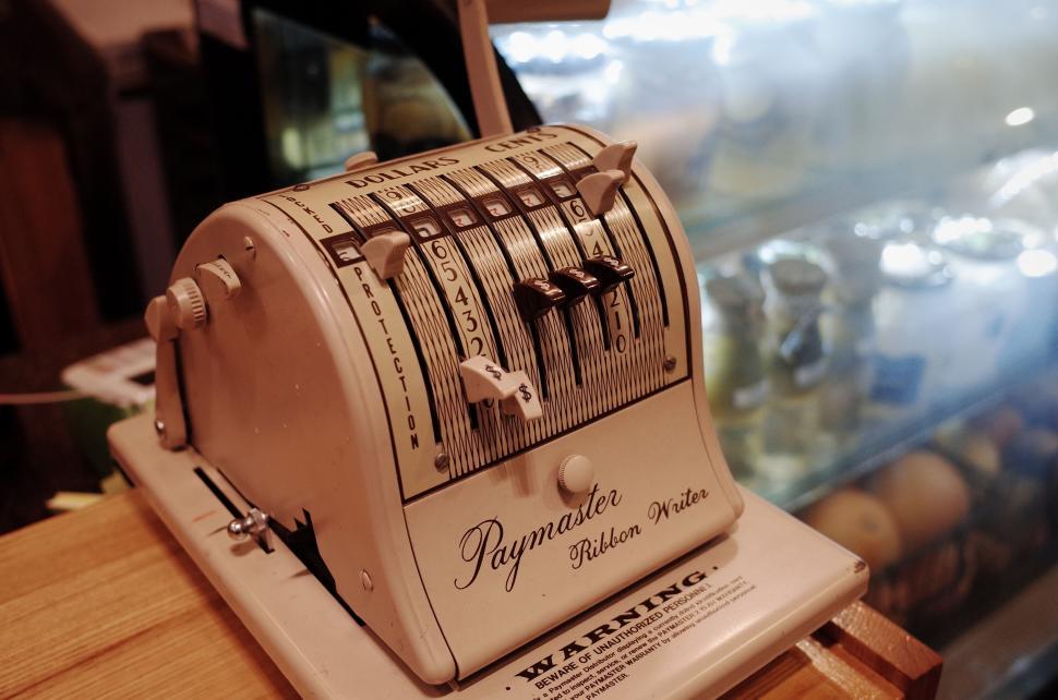 Free Stock Photo of Vintage Paymaster machine on a wooden counter ...
