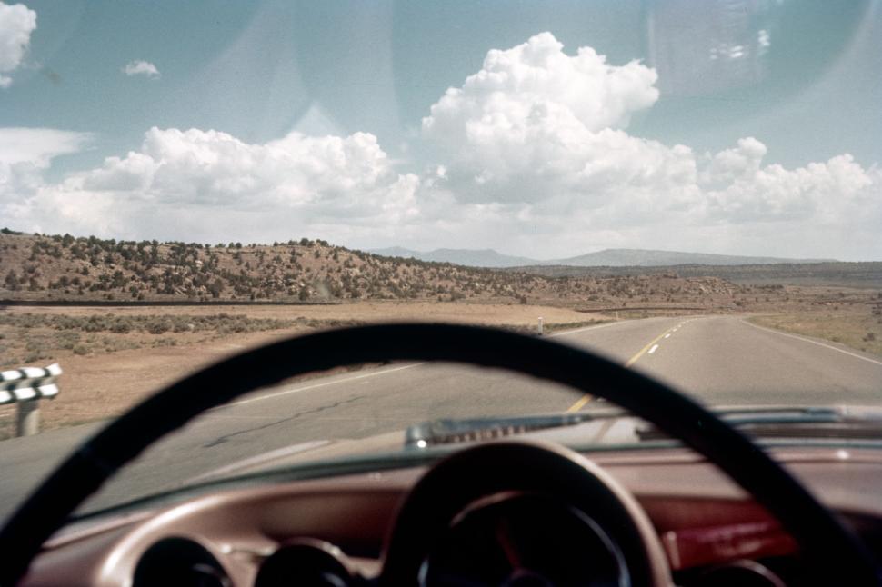Free Stock Photo of Vintage car driving on an open road under clear sky ...