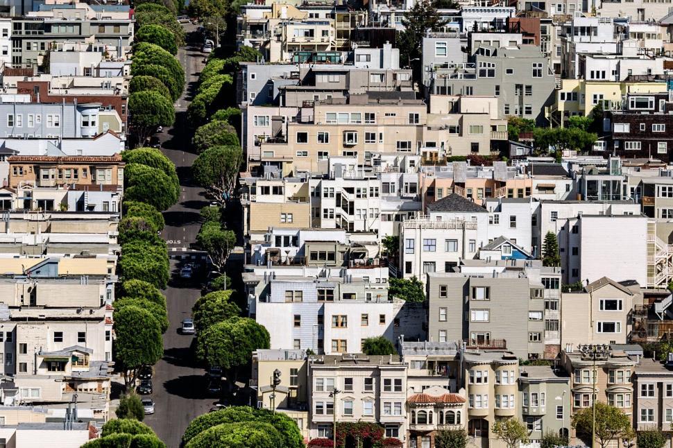Free Stock Photo of Aerial view of densely packed buildings with green ...
