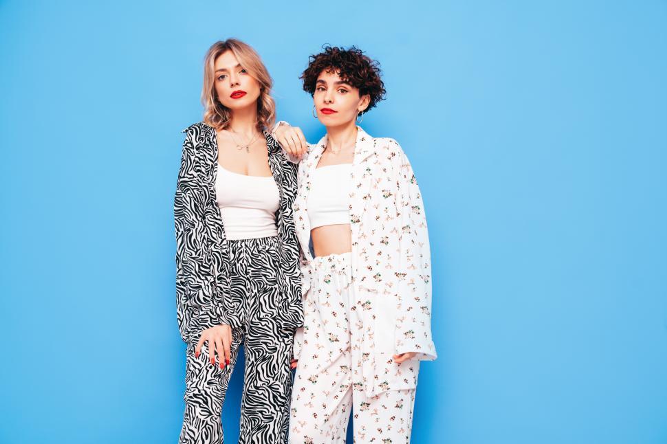 Free Stock Photo of Serious women in printed outfits standing together ...