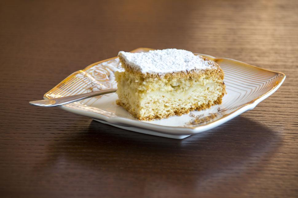 Free Stock Photo of Delicious slice of cake with powdered sugar on ...