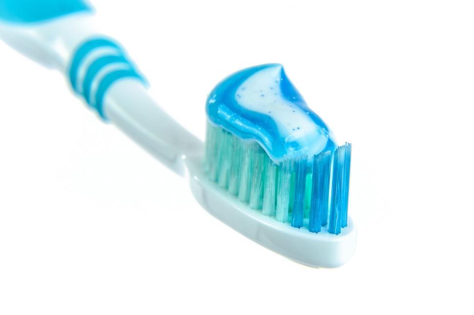 Free Stock Photo of Blue and white toothbrush with toothpaste close-up ...