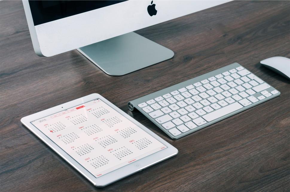 Free Stock Photo of IMac with tablet showing a calendar on wooden desk ...