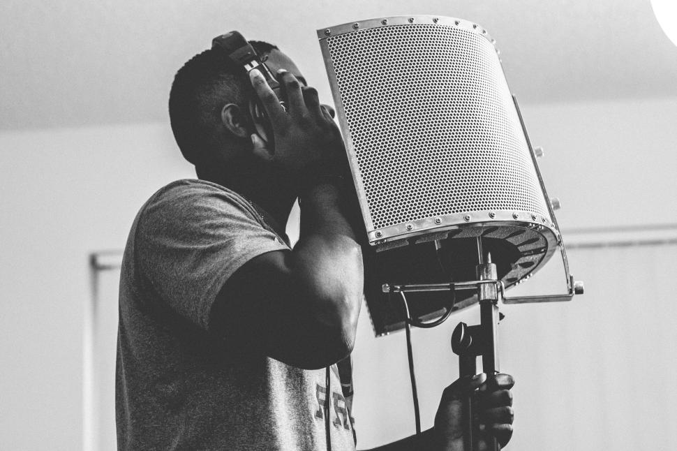 Free Stock Photo of Man recording vocals in a home studio with ...
