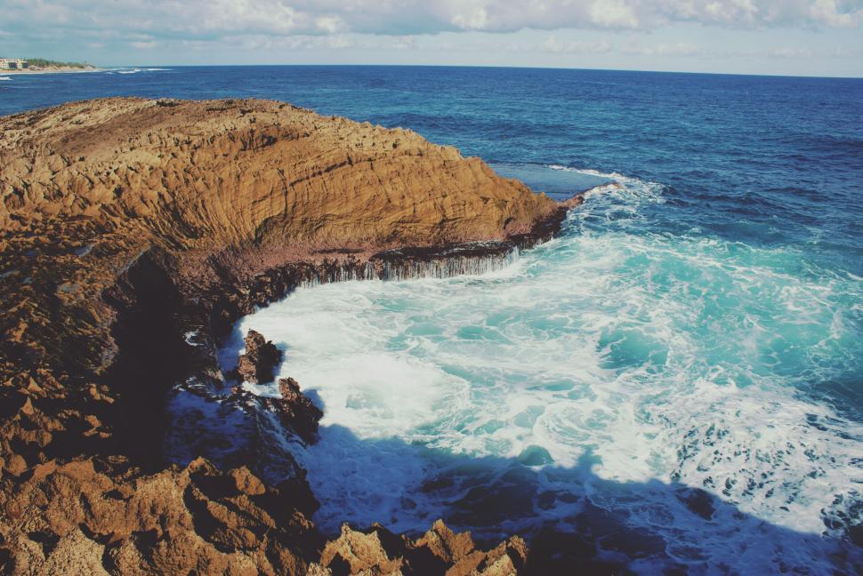 Free Stock Photo of Rocky shoreline with crashing waves and deep blue ...