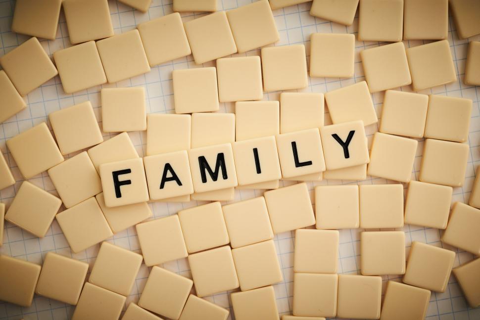 Free Stock Photo of Scrabble tiles spell FAMILY amidst arranged tiles ...