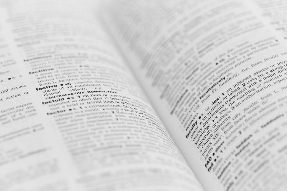 Free Stock Photo of Dictionary open showing words and definitions in ...