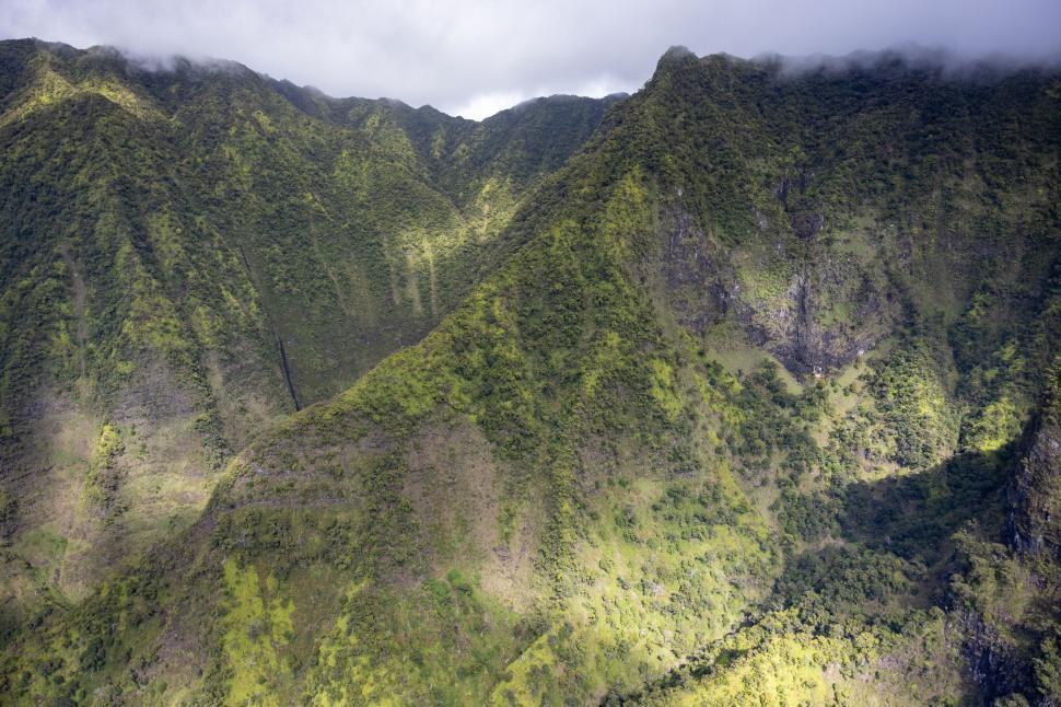 Free Stock Photo of Aerial view of lush green mountainous terrain ...