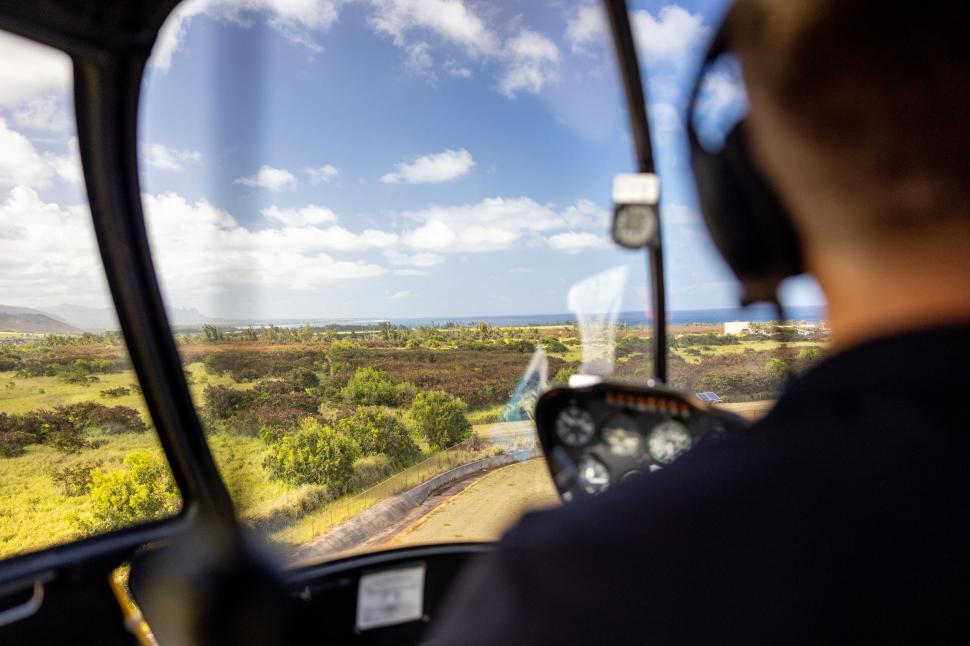 Free Stock Photo of Helicopter cockpit view of a lush green landscape ...