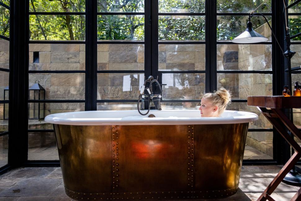 Free Stock Photo of Luxurious bath with warm lighting and natural view ...